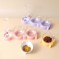 China Pet Water Bottle Double Bowl Feeding Cup 550ml Food Grade Portable Dog Water Dispenser for sale
