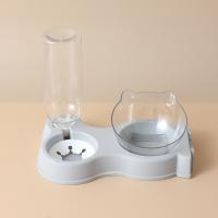 China Pet Water Bottle Double Bowl Feeding Cup 550ml Food Grade Portable Dog Water Dispenser for sale