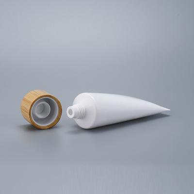 China Custom 50g to 150g Cosmetic Plastic Tube with Bamboo Cover Screen Printing for sale