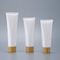 China Custom 50g to 150g Cosmetic Plastic Tube with Bamboo Cover Screen Printing for sale