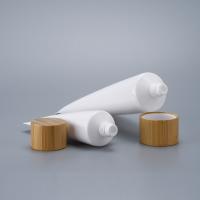 China Custom 50g to 150g Cosmetic Plastic Tube with Bamboo Cover Screen Printing for sale