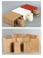 China Takeaway Packaging Kraft Paper Bag with Customized Logo Printing and Hand-Held Design for sale