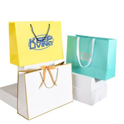 China Custom Kraft Paper Shopping Bags with Handles Eco-Friendly Biodegradable 30x40cm for sale