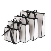 China Custom Logo Printed Kraft Paper Gift Bag Eco Friendly Shopping Bag 30x40cm for sale