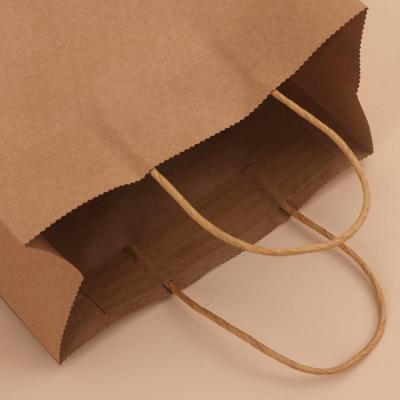 China Double Corrugated Paper Cup Handle Kraft Paper Bag for Shopping Simple Style Solution for sale