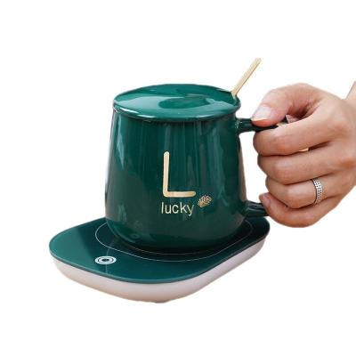 China 55 Degree Thermostatic Ceramic Cup Set 400ml with Automatic Heating Coasters Custom Logo for sale