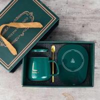China 55 Degree Thermostatic Ceramic Cup Set 400ml with Automatic Heating Coasters Custom Logo for sale