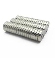 China Neodymium Permanent Rare Earth Ring Magnets with M3 Countersink Holes - N35 to N52 Grade, ±0.05mm Tolerance for sale
