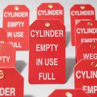 China Custom Printed Logo Perforated Tags PVC Cylinder Empty Tag for Warning for sale