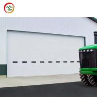 China Industrial Vertical Lift Overhead Steel Workshop Door with Transparent Windows - 450-550mm Panel Height, 600-1200N Motor Force for sale