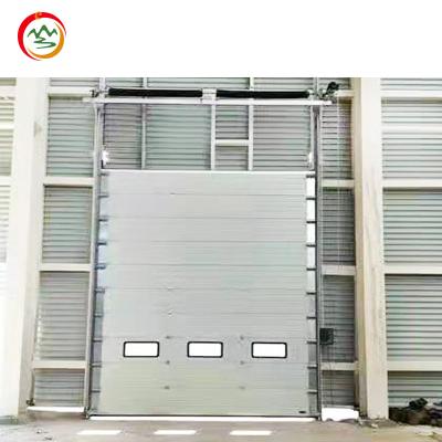China Industrial Vertical Overhead Sectional Warehouse Dock Door 450mm-550mm Panel Height with 600N-1200N Motor Options for sale