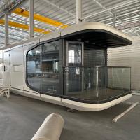 China Customized Steel Space Capsule House for Outdoor Hotels - Modern Prefabricated Structure with Toughened Glass Windows for sale