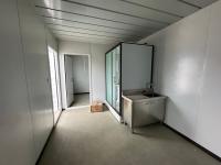 China Fireproof Flat Pack Container House 20FT 40FT Galvanized Steel Sandwich Panel for sale