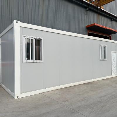 China Customized Light Steel Frame Flat Pack Container House 20ft 40ft with Fiber Glass Roof and Aluminum Window for sale