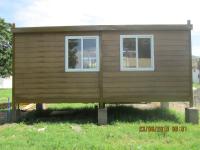 China Flat Pack Container House 20FT 40FT Galvanized Steel Sandwich Panel Prefab Office 30 Year Service Life for sale
