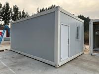 China Flat Pack Container House 50mm EPS Sandwich Panel Prefab Cabin Eco-Friendly Dormitory Housing for sale