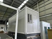 China Flat Pack Container House 50mm EPS Sandwich Panel Prefab Cabin Eco-Friendly Dormitory Housing for sale