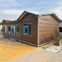 China Flat Pack Container House Hurricane Proof Prefab House 2.5mm Galvanized Steel 100 Sets Daily Capacity for sale
