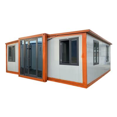 China Expandable Prefab Container House on Wheels 20FT 40FT Double Wing EPS Insulated Mobile Home for sale