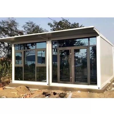 China Flat Pack Container House 40ft 20ft Sandwich Panel Prefabricated House for Hotel Accommodation for sale