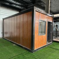 China Breathable Container House 50mm EPS Wall Panels Steel Security Door Prefabricated Home for sale
