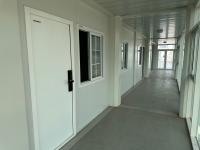 China 20ft Flat Pack Container House Two Story Prefabricated Modular Home 3m Width Custom Design for sale
