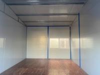 China 50/75/100mm Wave Sandwich Panel Prefabricated Steel Structure House - 500,000 sqm Capacity for Tropical Regions for sale