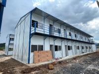 China Prefabricated Steel Security Storage Shed 50mm Sandwich Panel Flat Roof House for sale