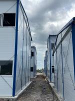 China Prefabricated Two Story House with Steel Frame and Sandwich Panel 100kmh Wind Resistance for sale
