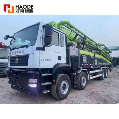 China 2021 Zoomlion Scania 63m Concrete Pump Truck with 58m Horizontal Reach and 44,000kg Weight for sale