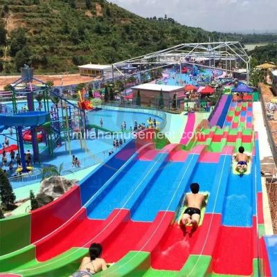 China Fiberglass Racing Rainbow Water Slide 12m Platform Height 1 Rider Water Park Slide for sale