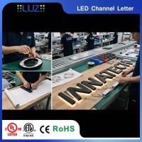 China Matt Black Painted Metal Shell Warm White Halo Lit LED Signage With Standoffs For Corporate Office Lobby for sale