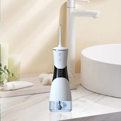 China LCD Smart Display Handheld Oral Irrigator Water Flosser 350ml Water Tank for sale