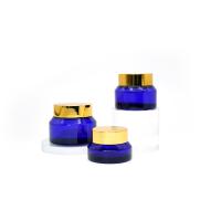 China Hanya Glass Lotion Bottles 30g 50g Blue Cosmetics Glass Jar for sale