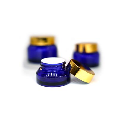 China Hanya Glass Lotion Bottles 30g 50g Blue Cosmetics Glass Jar for sale
