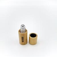 China 1ml 2ml Mini Perfume Aromatherapy Glass Roll On Bottles Wooden Shell for sale