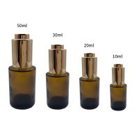 China Flat Shoulder Essential Oil Glass Eye Dropper Bottles Non Toxic for sale
