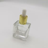 China 30 Ml 35 Ml Essential Oil Container Glass Flat Shoulder Transparent Dropper Bottle for sale