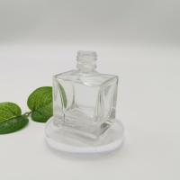 China 30 Ml 35 Ml Essential Oil Container Glass Flat Shoulder Transparent Dropper Bottle for sale