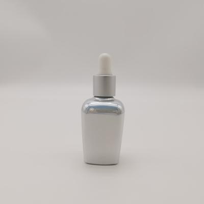 China Cosmetic Skincare Container Round Clear Glass Essential Oil Serum Dropper Bottles for sale