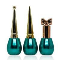 China Hanya Small Green Nail Polish Bottles With Long Golden Cone Cap for sale