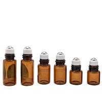 China Cylinder Amber Glass Roll On Bottles 2ml 3ml 5ml Rollerball Perfume Container for sale
