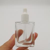 China Square Transparent Cosmetic Glass Lotion Bottles With Dropper 1oz 2oz for sale