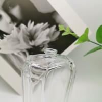 China Flat Shoulder Clear Glass Perfume Spray Bottles 30ml 50ml 100ml for sale