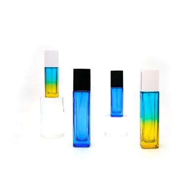 China Hanya Glass Lotion Bottles Square Blue Yellow 50ml Foam Pump Bottle for sale