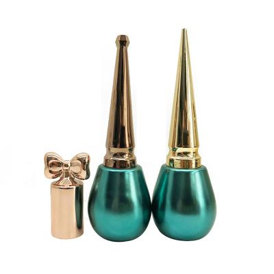 China Hanya Golden Cone Cap Nail Polish Bottles Green Empty Nail Polish Container for sale