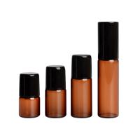 China Plastic Cap 10ml Amber Glass Roller Bottles For Essential Oils Refillable for sale