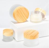 China Glass lotion bottles with bamboo design matte glass 30g 50g 100g for sale