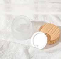 China Glass lotion bottles with bamboo design matte glass 30g 50g 100g for sale