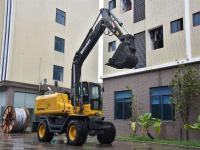 China Multifunction 90KN 12500kg 0.5m3 Wheel Excavator for sale